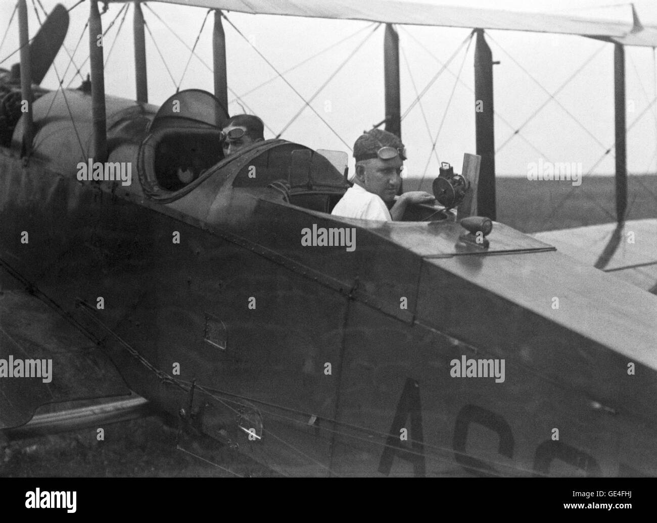 This image highlights two pilots operating a NASA aircraft, emphasizing ...