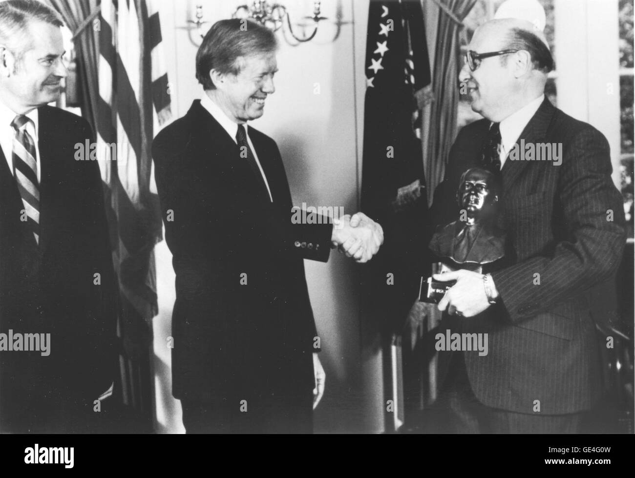Former President Jimmy Carter presents the Goddard Memorial Trophy to ...