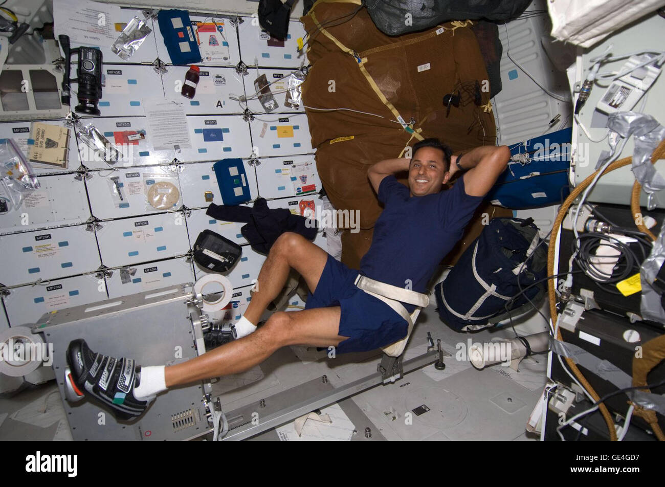 Astronaut Joe Acaba is seen performing exercise routines aboard the ...