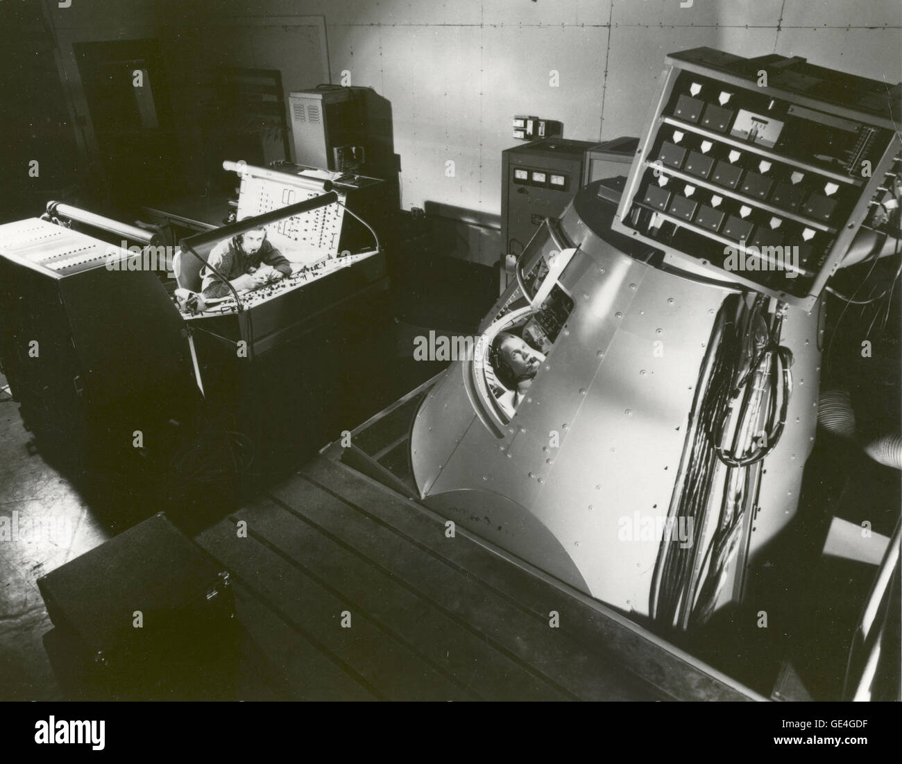 John H. Glenn, a Mercury astronaut, trains using the Mercury Procedures ...