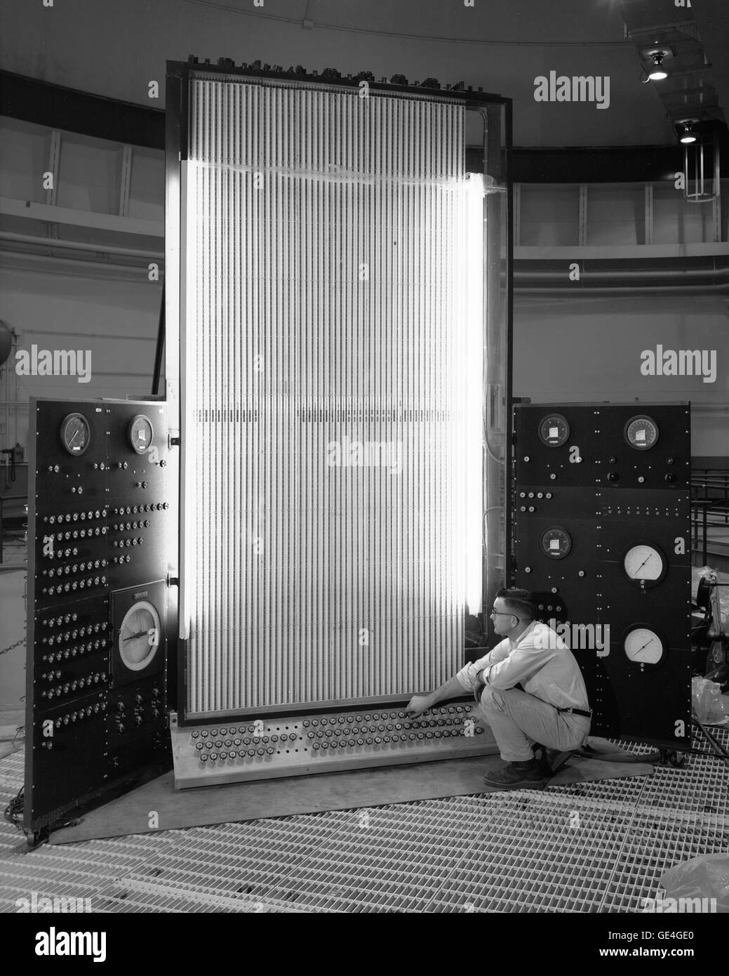 John Hire adjusts the console before the Plum Brook reactor's first ...