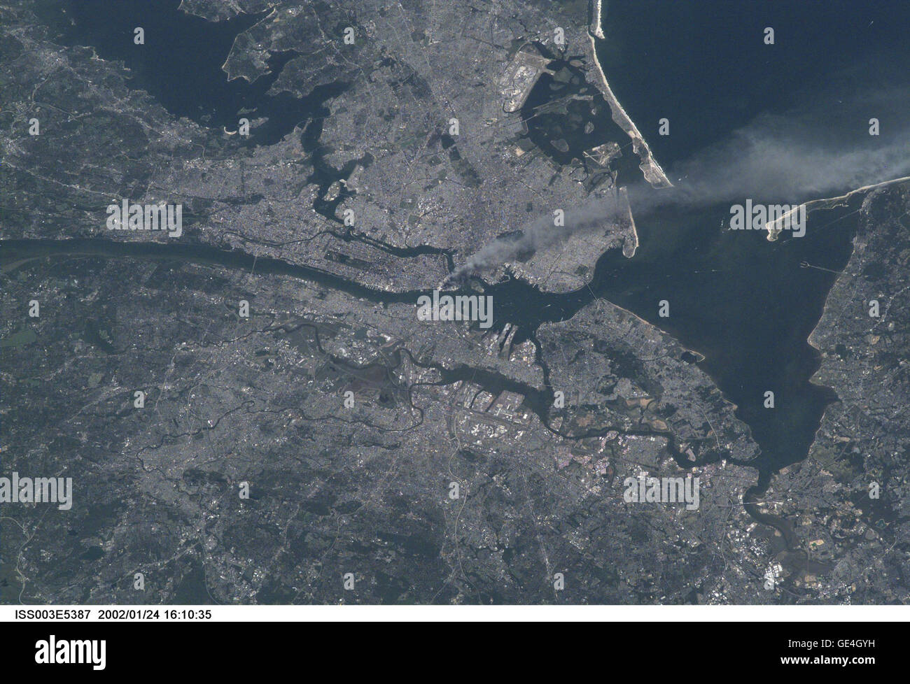 This image captures New York City on September 11, 2001, showing the ...