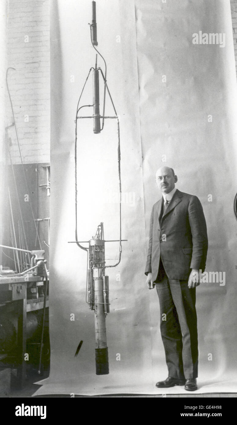 Robert Goddard stands next to his Double Acting Engine Rocket in 1925 ...
