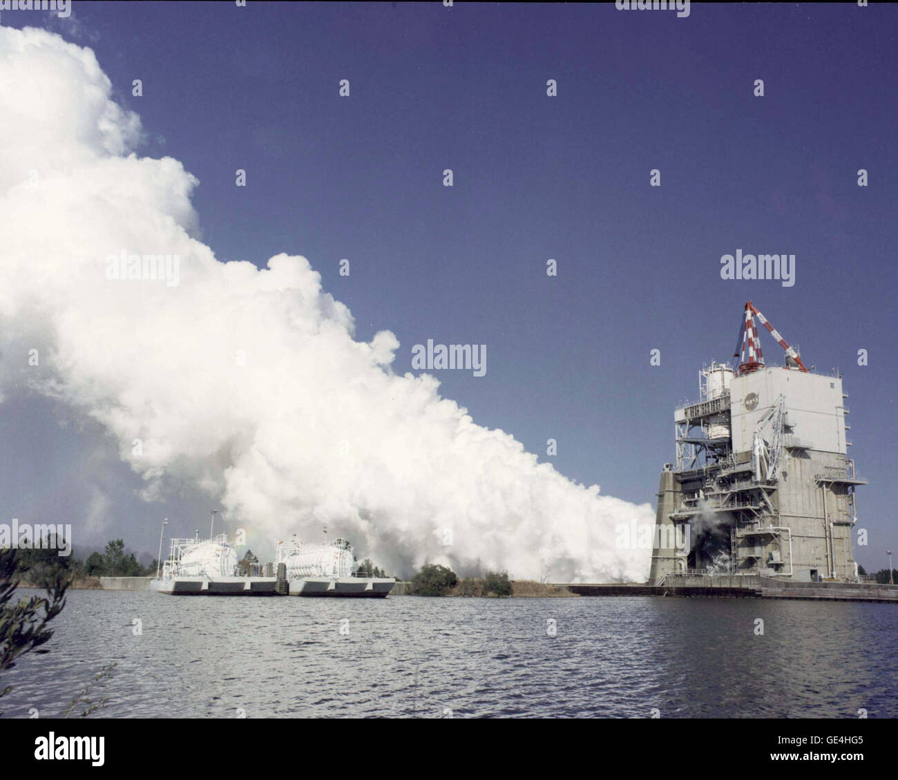 A Space Shuttle Main Engine undergoes a test firing at the A-1 test ...