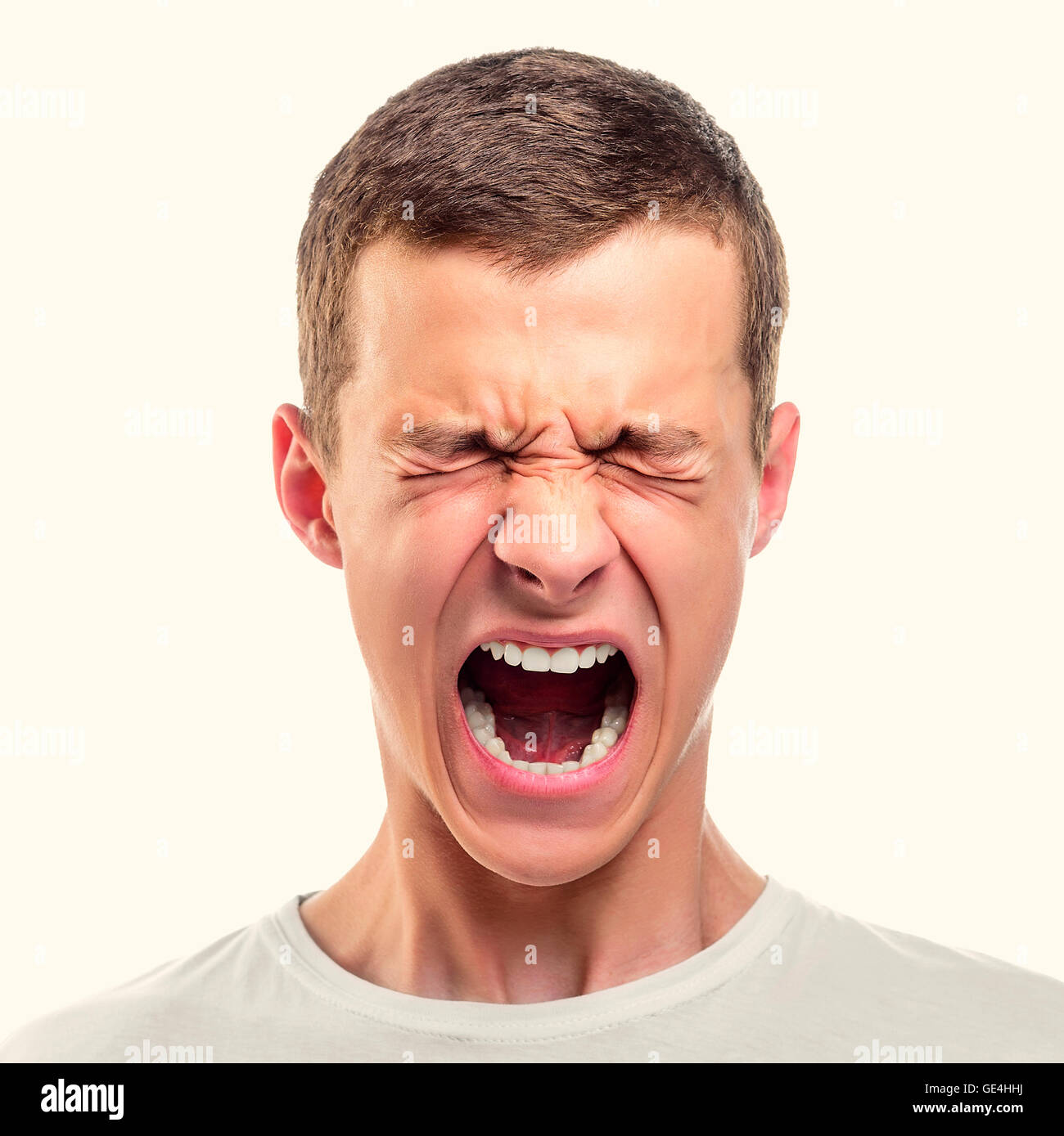 Portrait of young angry man. Toned photo Stock Photo - Alamy