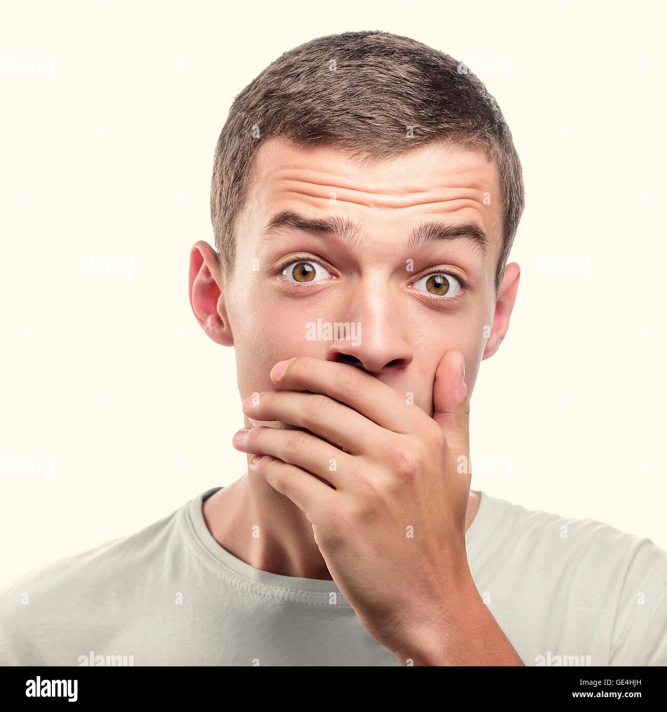 Portrait of amazed young man. Toned photo Stock Photo - Alamy