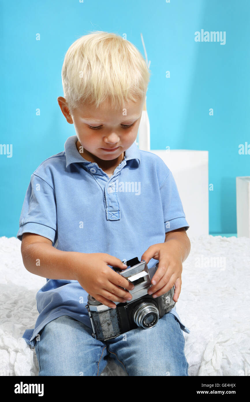 Boy with a camera Stock Photo - Alamy