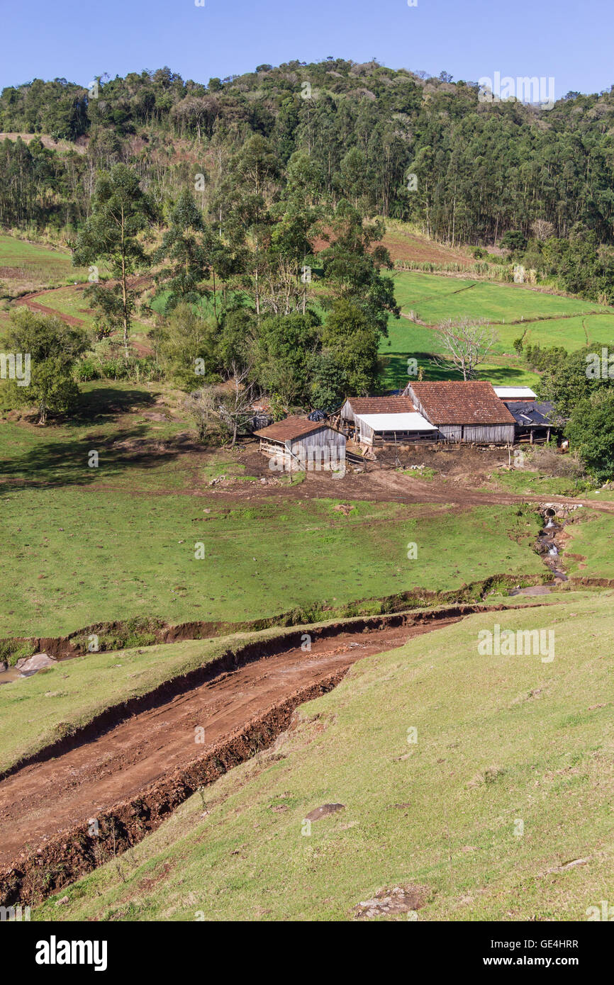 Farm with fields and forest Stock Photo - Alamy