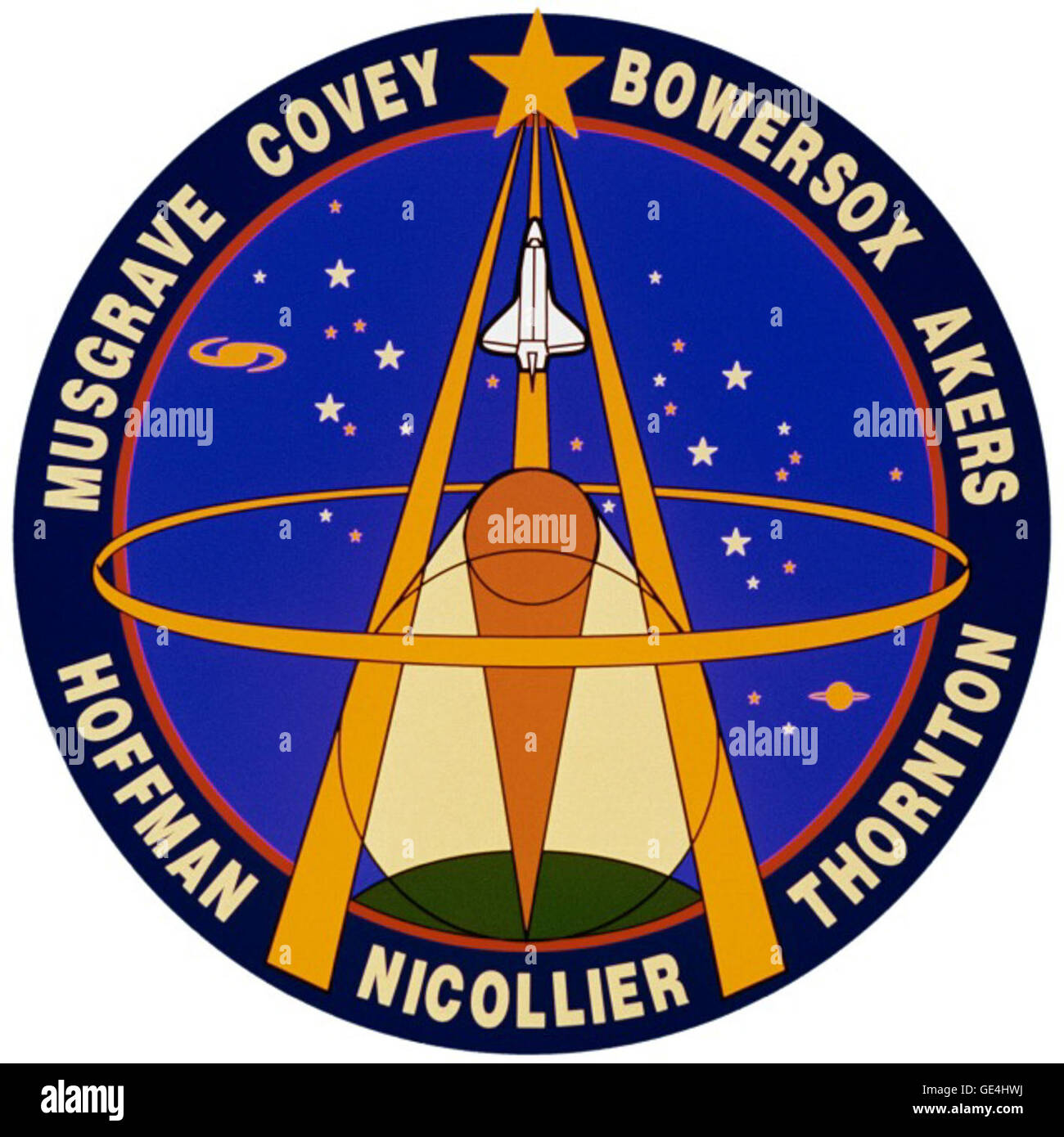 An image from the STS-61 mission, showing astronauts working on the ...