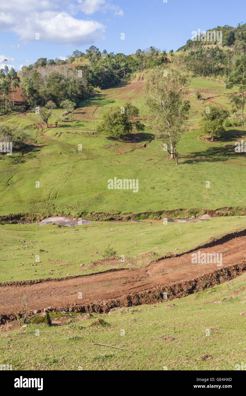Farm with fields and forest Stock Photo - Alamy