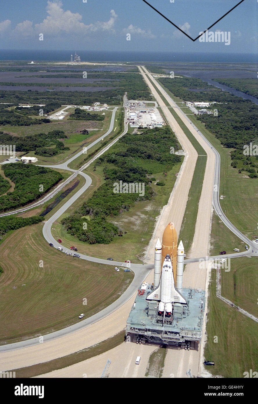 The Space Shuttle Atlantis is shown departing the Vehicle Assembly ...