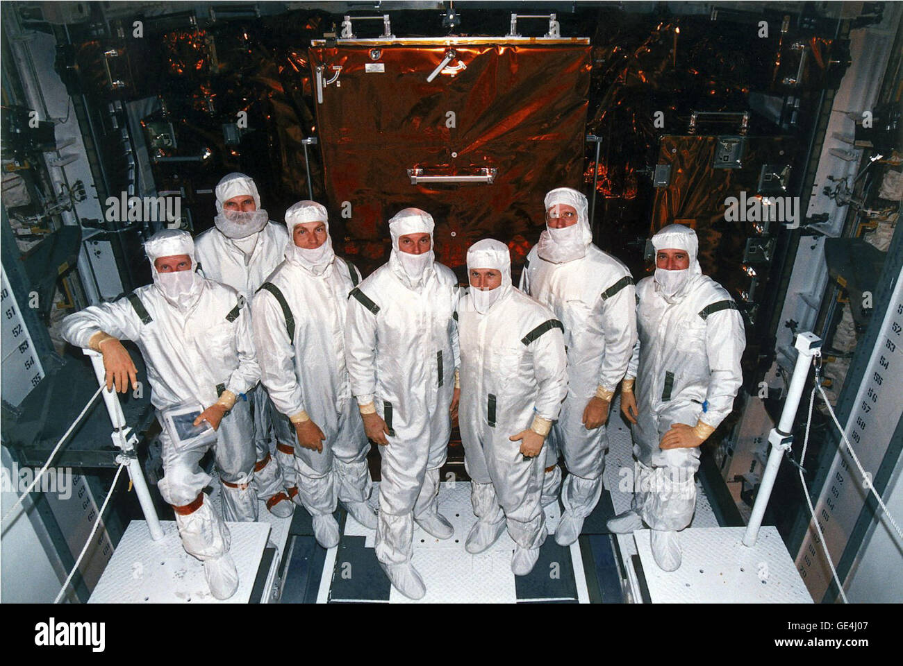 STS-82 crew members pose in their clean room suits 5134454299 o Stock ...