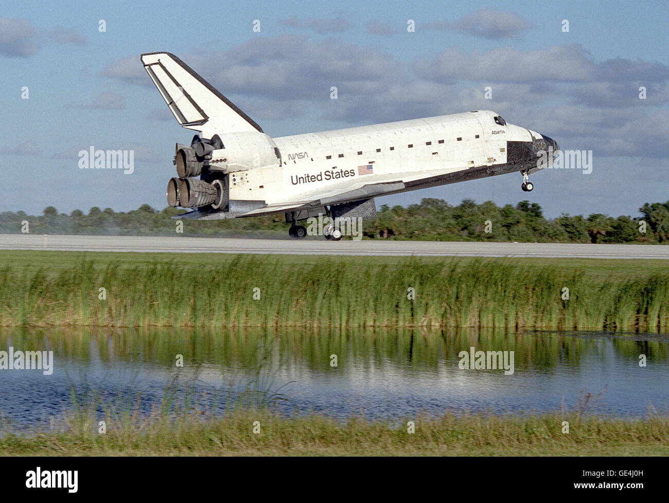 The Space Shuttle orbiter Atlantis touches down on Runway 15 of the ...