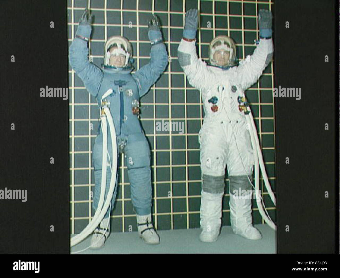 This image shows two astronauts performing mobility checks of different ...