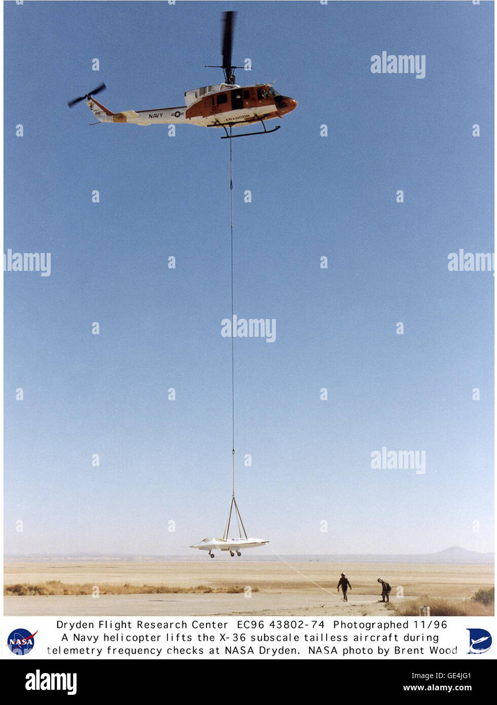 The X-36, a technology demonstrator aircraft, is shown being lifted by ...