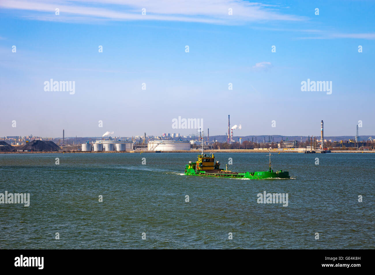 In a photo the barge floating on sea Stock Photo - Alamy