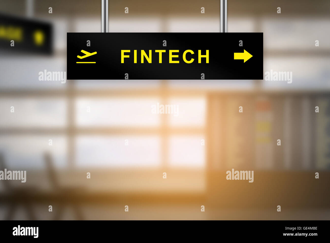 FINTECH or financial technology on airport sign board with blurred ...