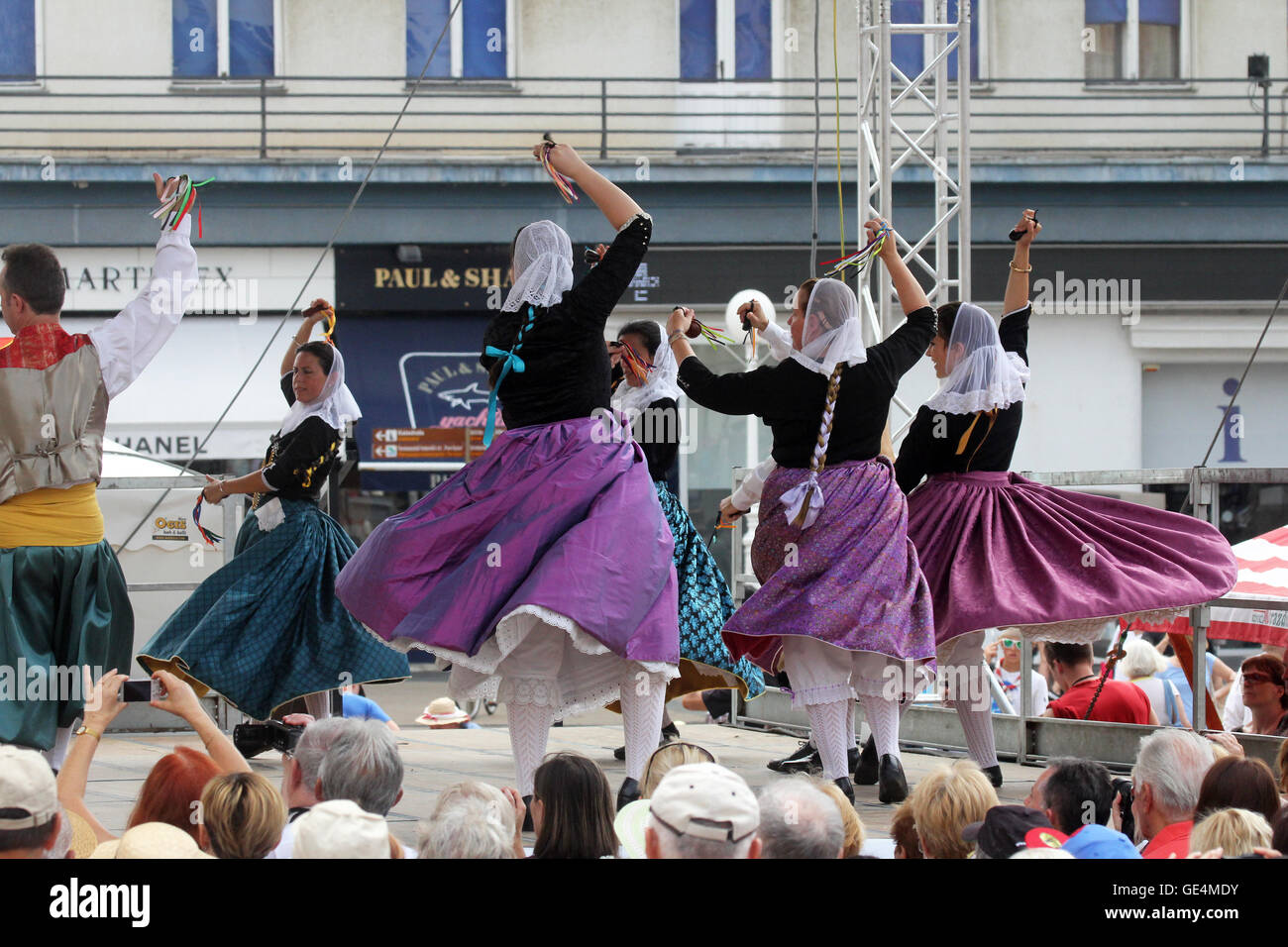Members of folk group Escola de ball de bot Calabruix from Mallorca ...