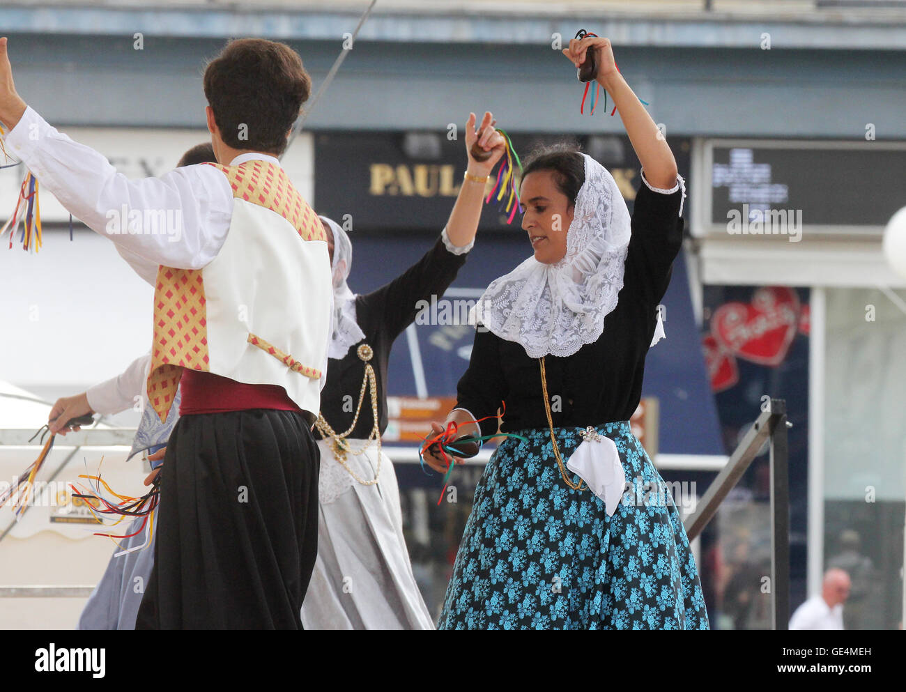 Members of folk group Escola de ball de bot Calabruix from Mallorca ...