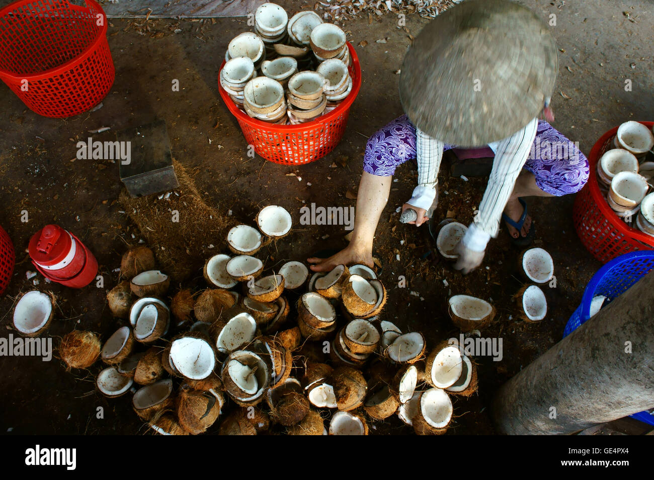 BEN TRE, VIET NAM, Asian worker working at coconut workshop with ...
