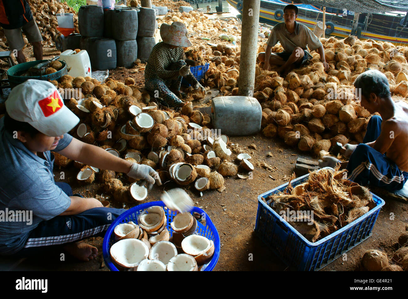 BEN TRE, VIET NAM, Asian worker working at coconut workshop with ...