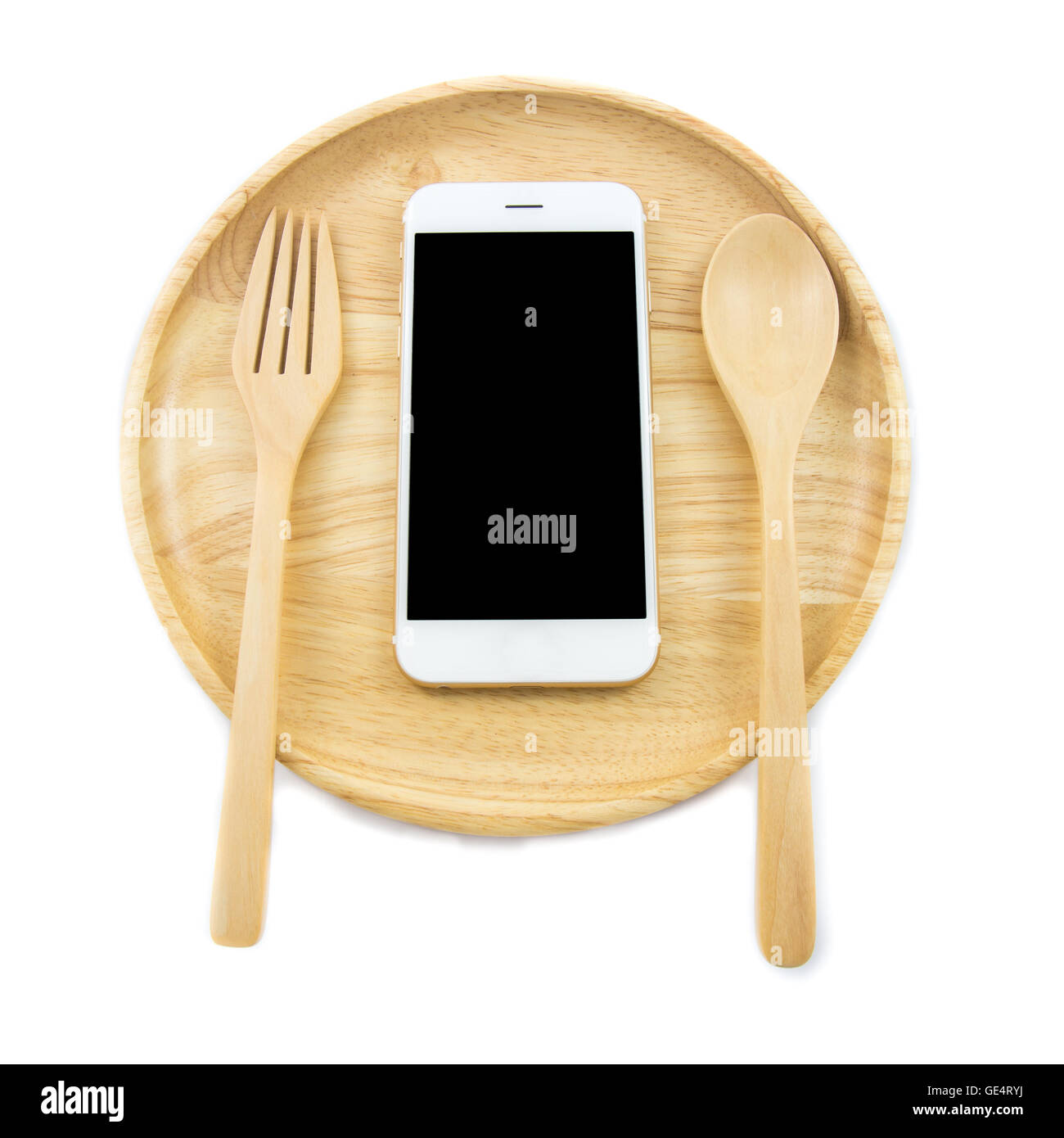 Top view smartphone on wooden dish with spon and fork on white ...