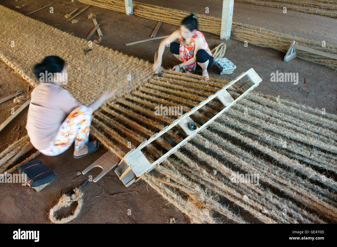 Asian worker work inside coir mat workshop Stock Photo - Alamy