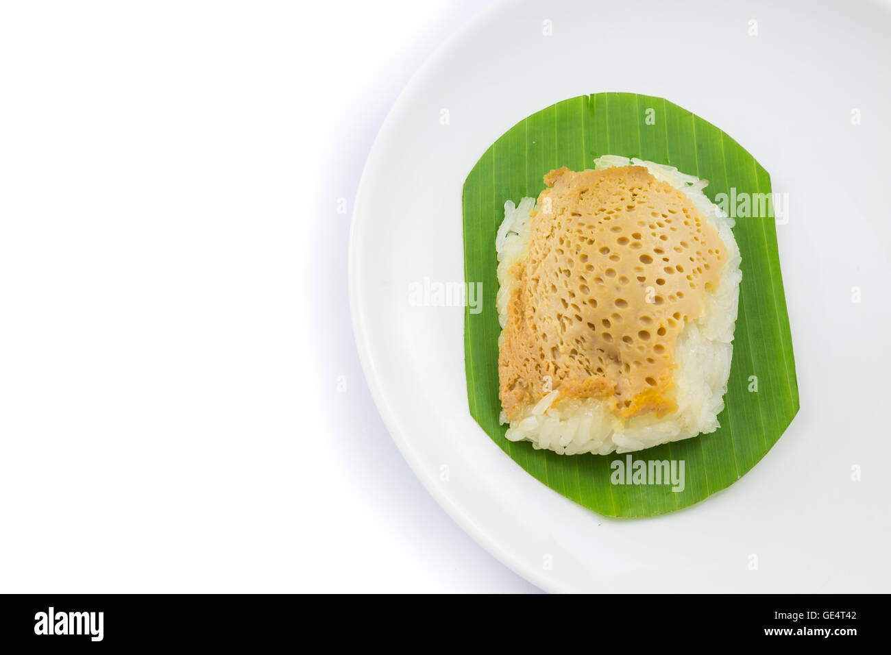 sticky rice with steamed custard on banana leaves and dish, sweet ...