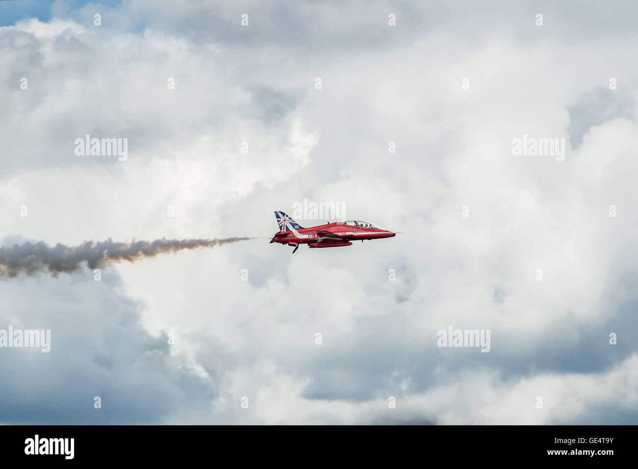 Flying red arrow Stock Photo - Alamy