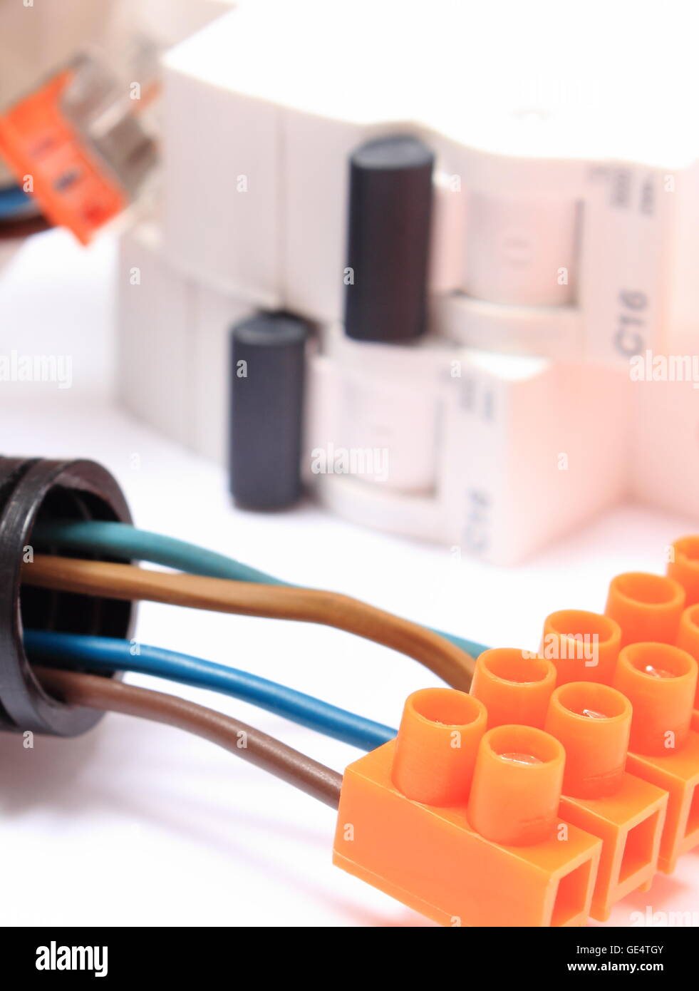 Corrugated plastic pipe, cable with connection block and electric fuse ...