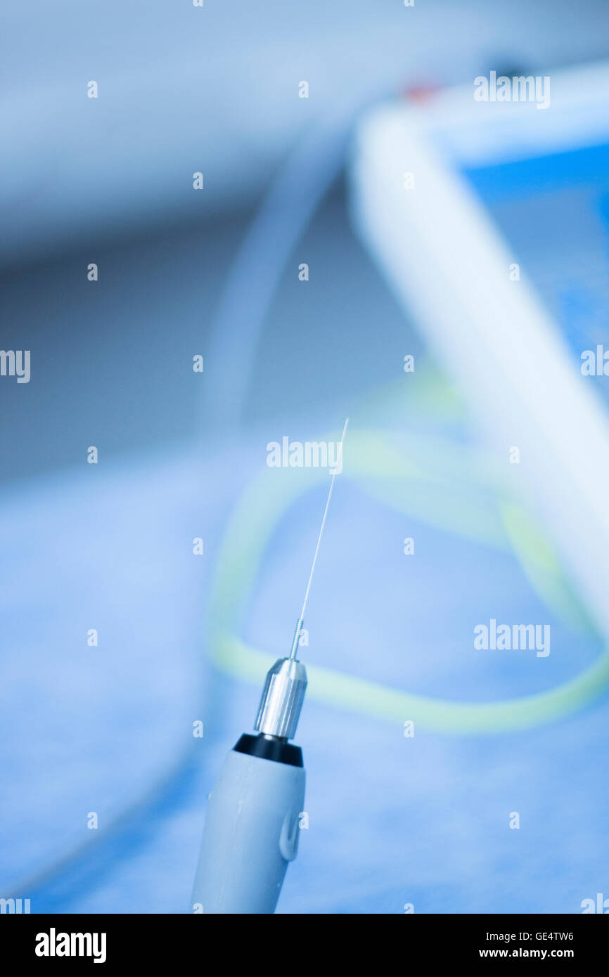Electroacupunture cables connecting machine to needles used by ...