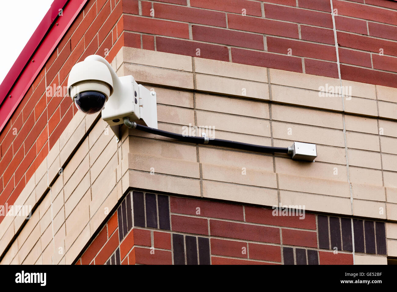 Security camera on a public building Stock Photo - Alamy