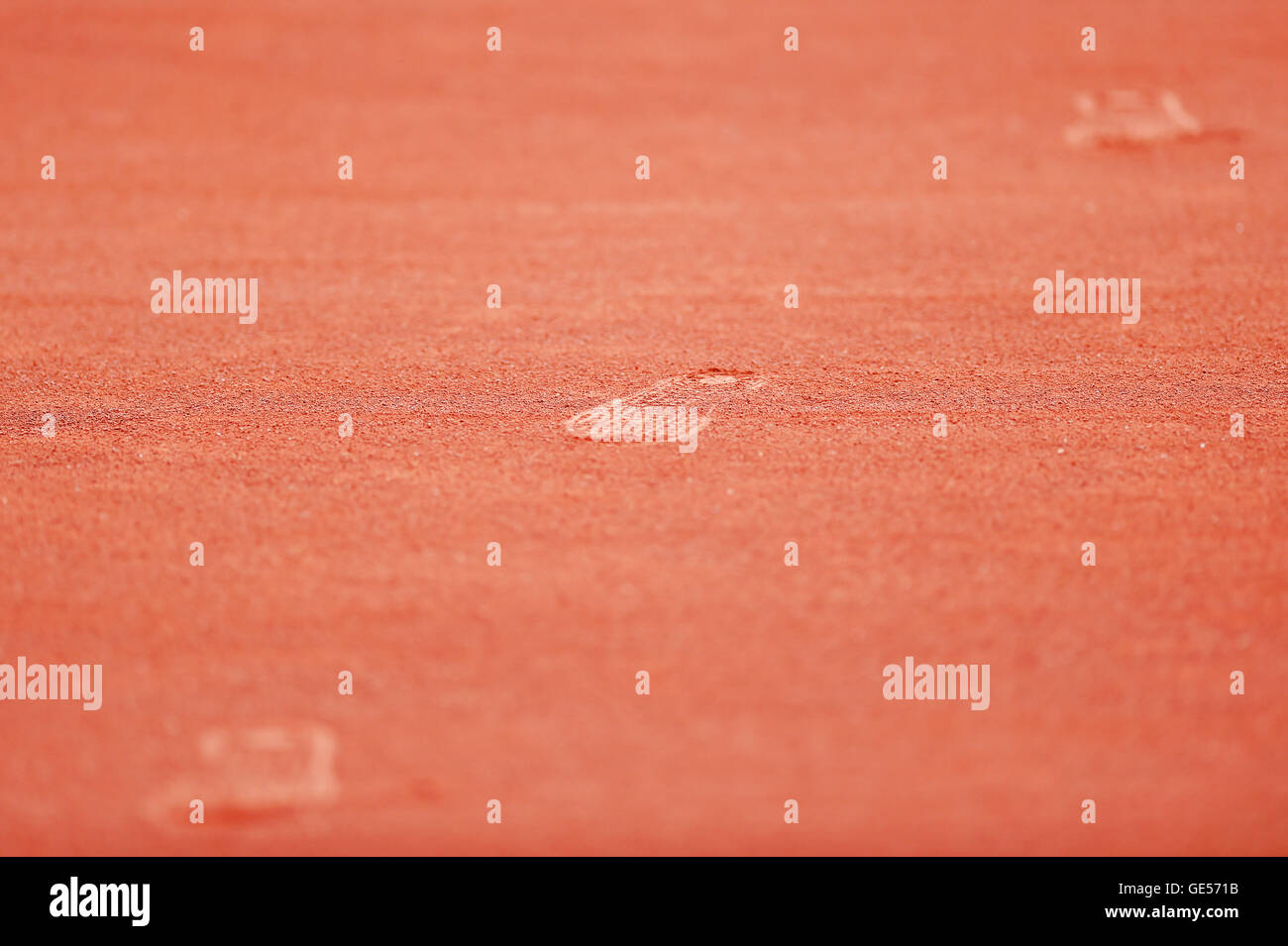 Detail with a sport shoe footprint on a tennis clay court Stock Photo ...
