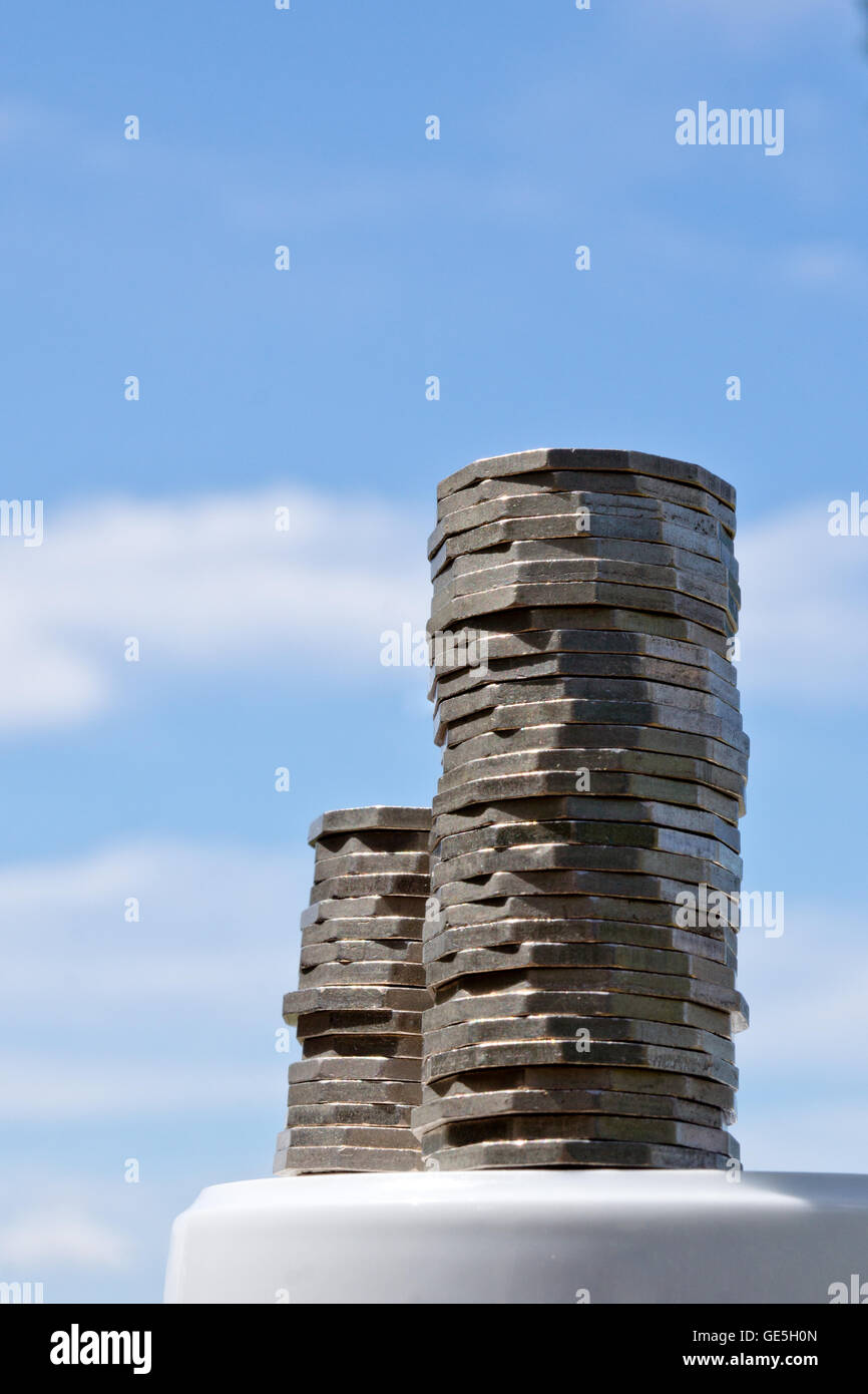 Fifty cent pieces with sky behind, background Stock Photo - Alamy