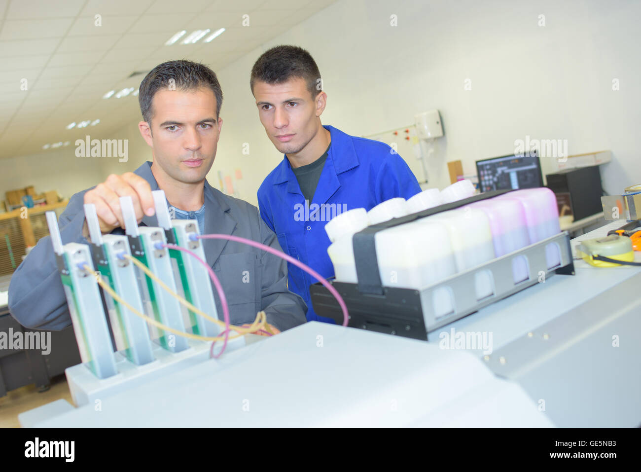 Maintain overalls hi-res stock photography and images - Alamy