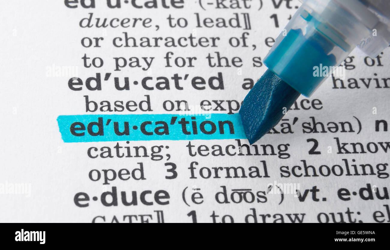 Highlighted word Education in a dictionary Stock Photo - Alamy
