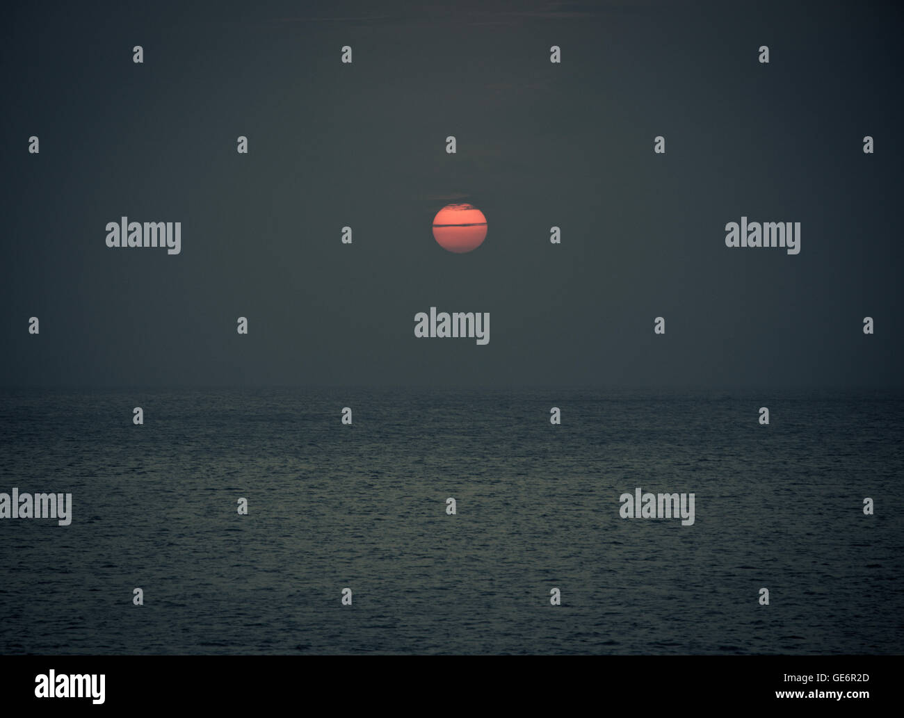 The sun was falling sea water Stock Photo - Alamy