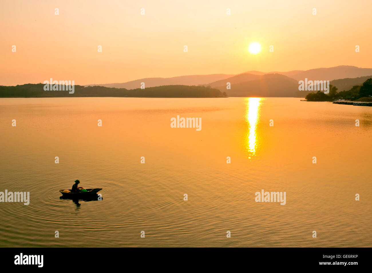 Fisherman with his tool in river Stock Photo - Alamy