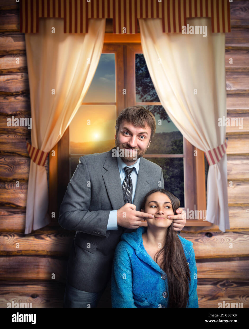 Man making a woman smile Stock Photo - Alamy