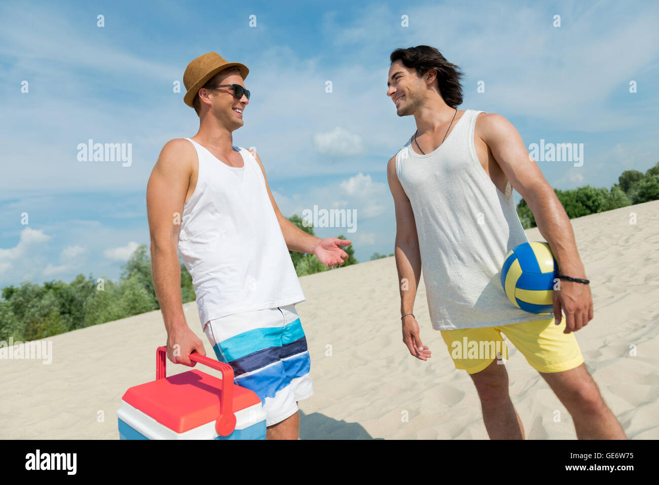 Positive friends having a nice talk Stock Photo - Alamy