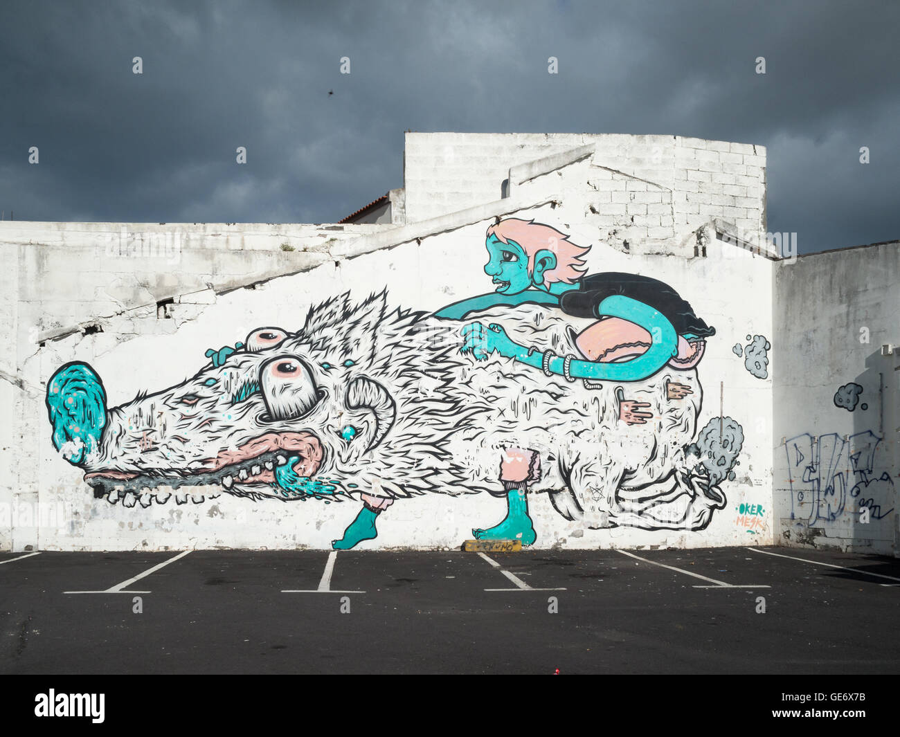 Graffiti in parking lot Stock Photo - Alamy