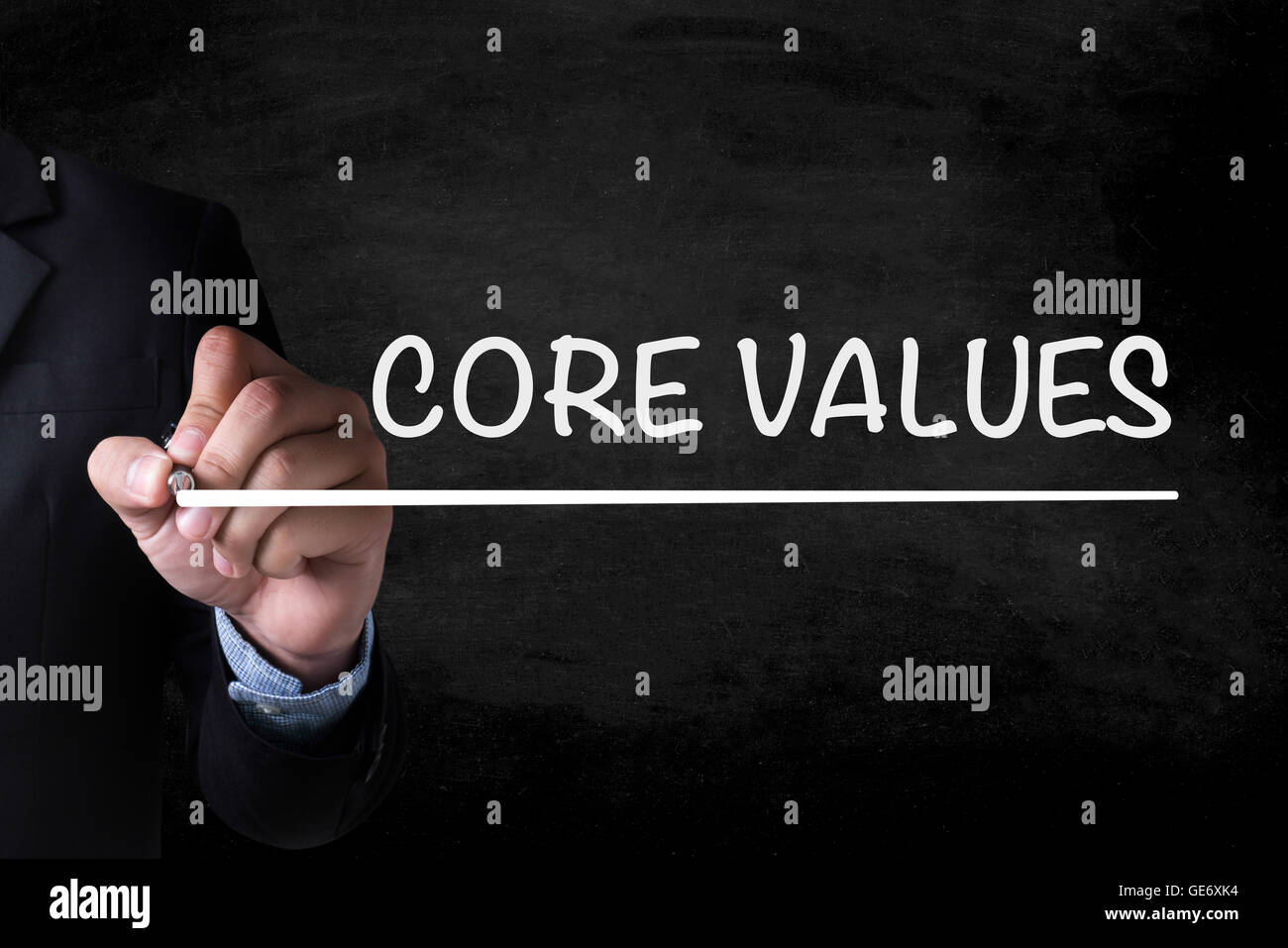 CORE VALUES and Businessman drawing Page on blackboard Stock Photo - Alamy
