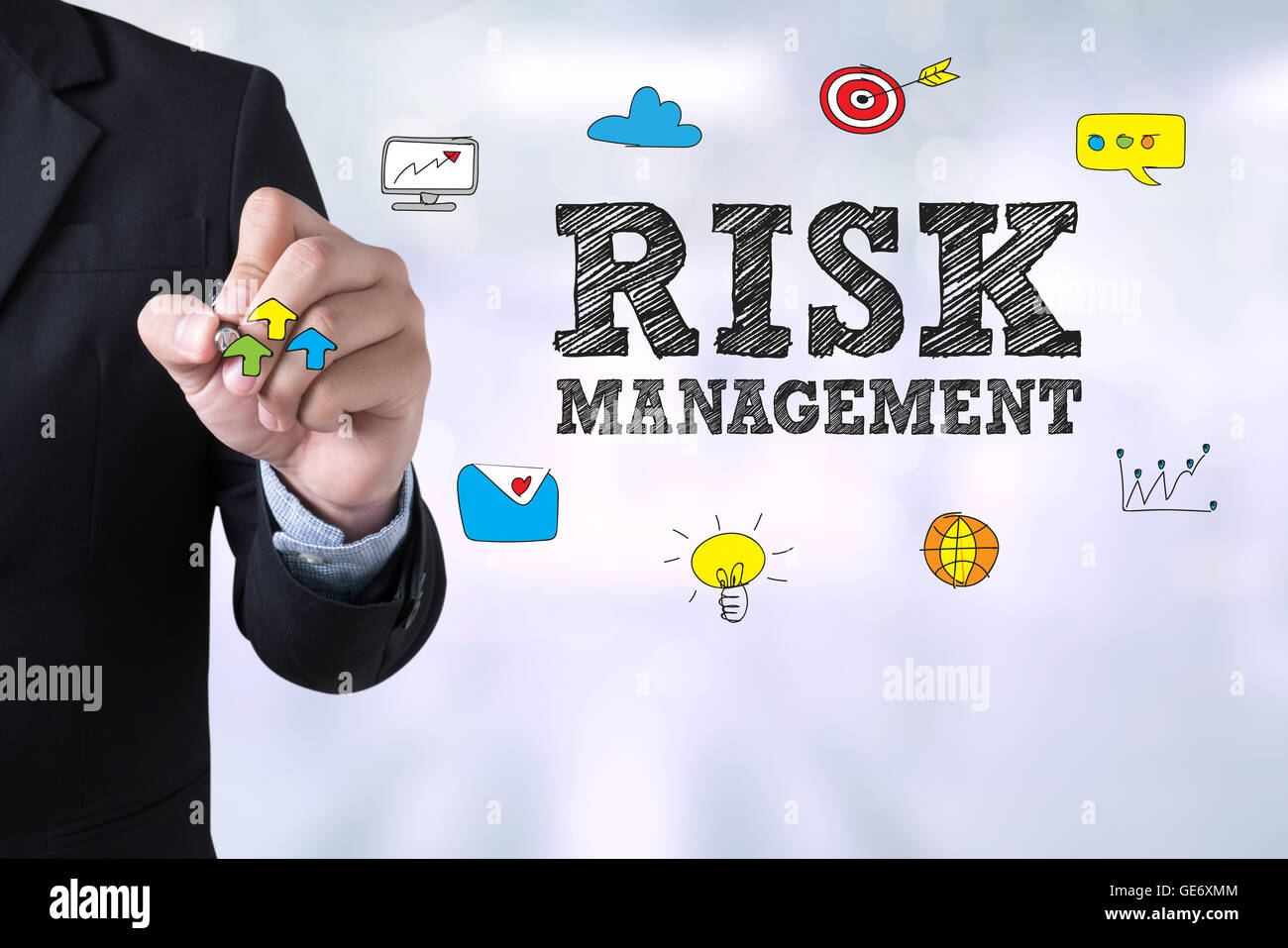 RISK MANAGEMENT Businessman drawing Landing Page on blurred abstract ...