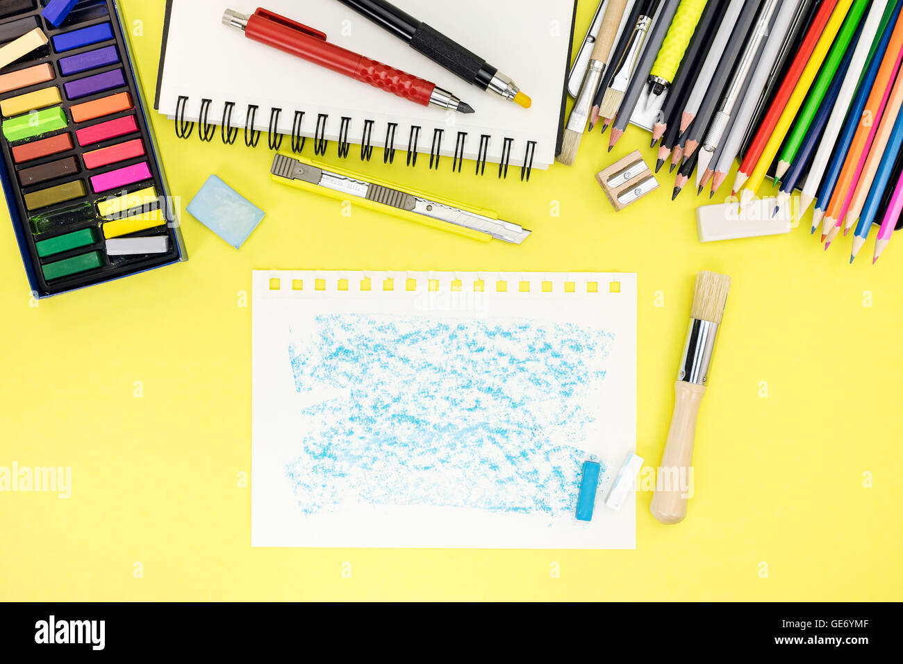 pupil workplace background with blue paper, notebook and other office ...