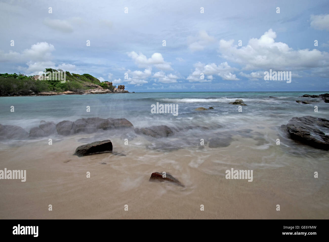 beautiful sea beach with fog wave in summer day Stock Photo - Alamy