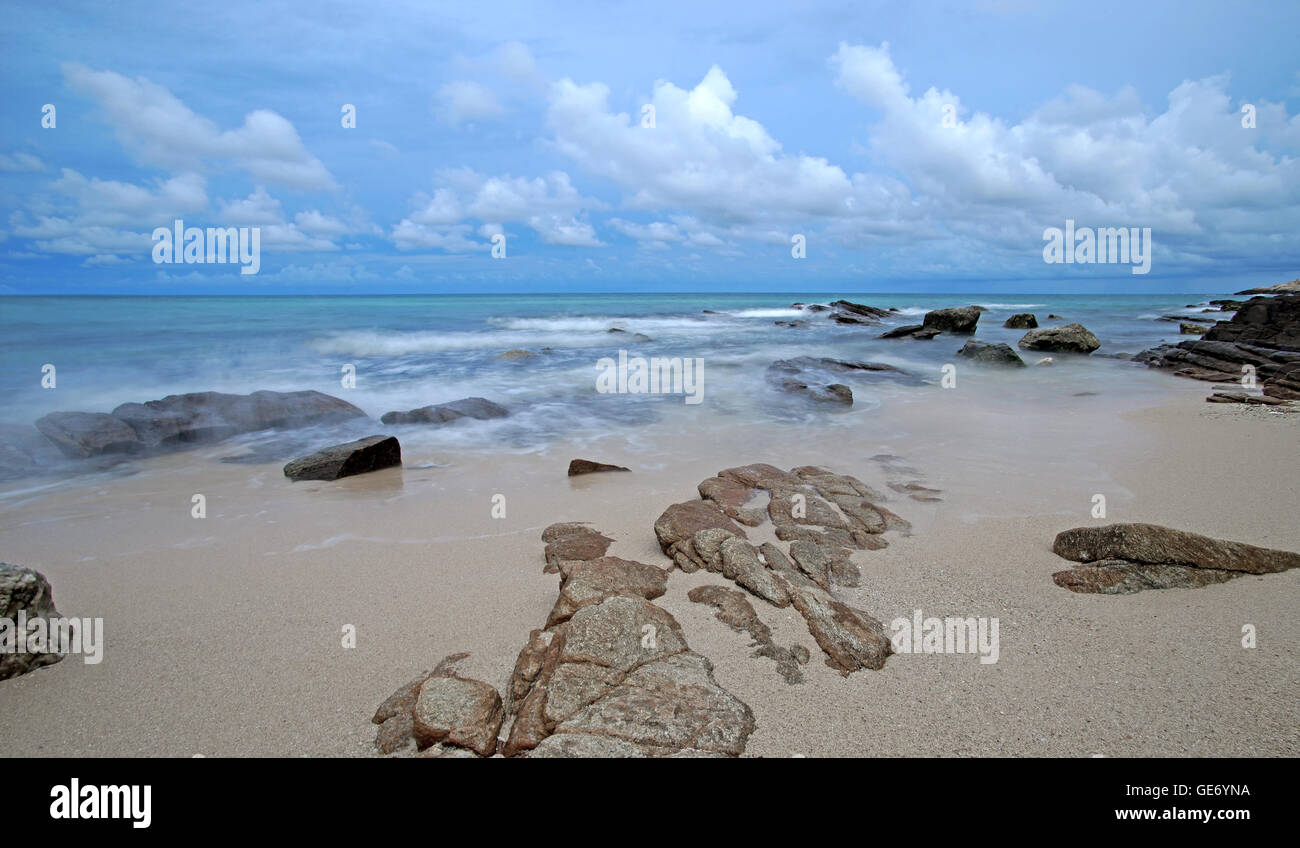 beautiful sea beach with fog wave in summer day Stock Photo - Alamy