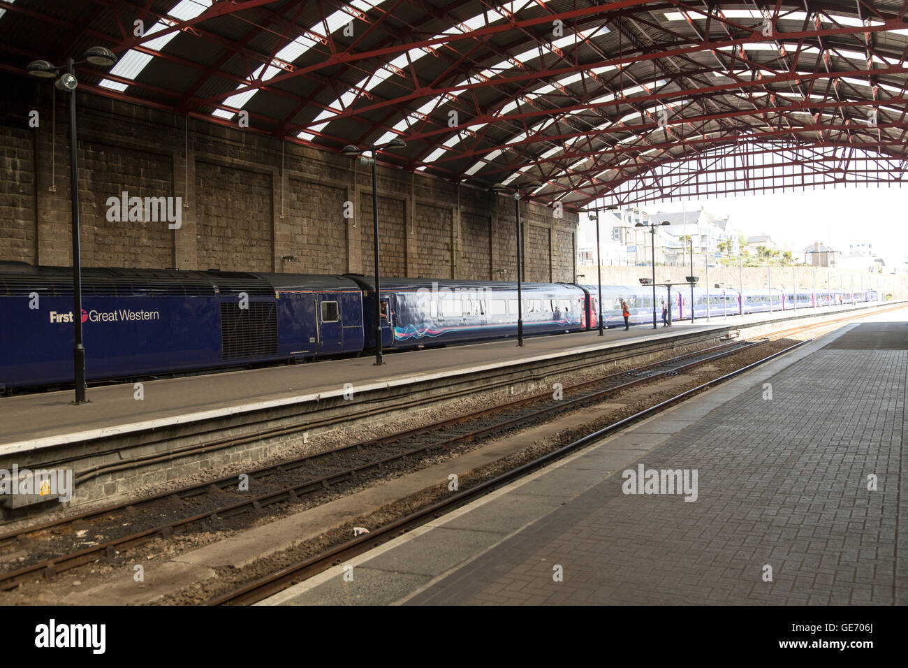 Railway station interior with First Great Western train at platform ...