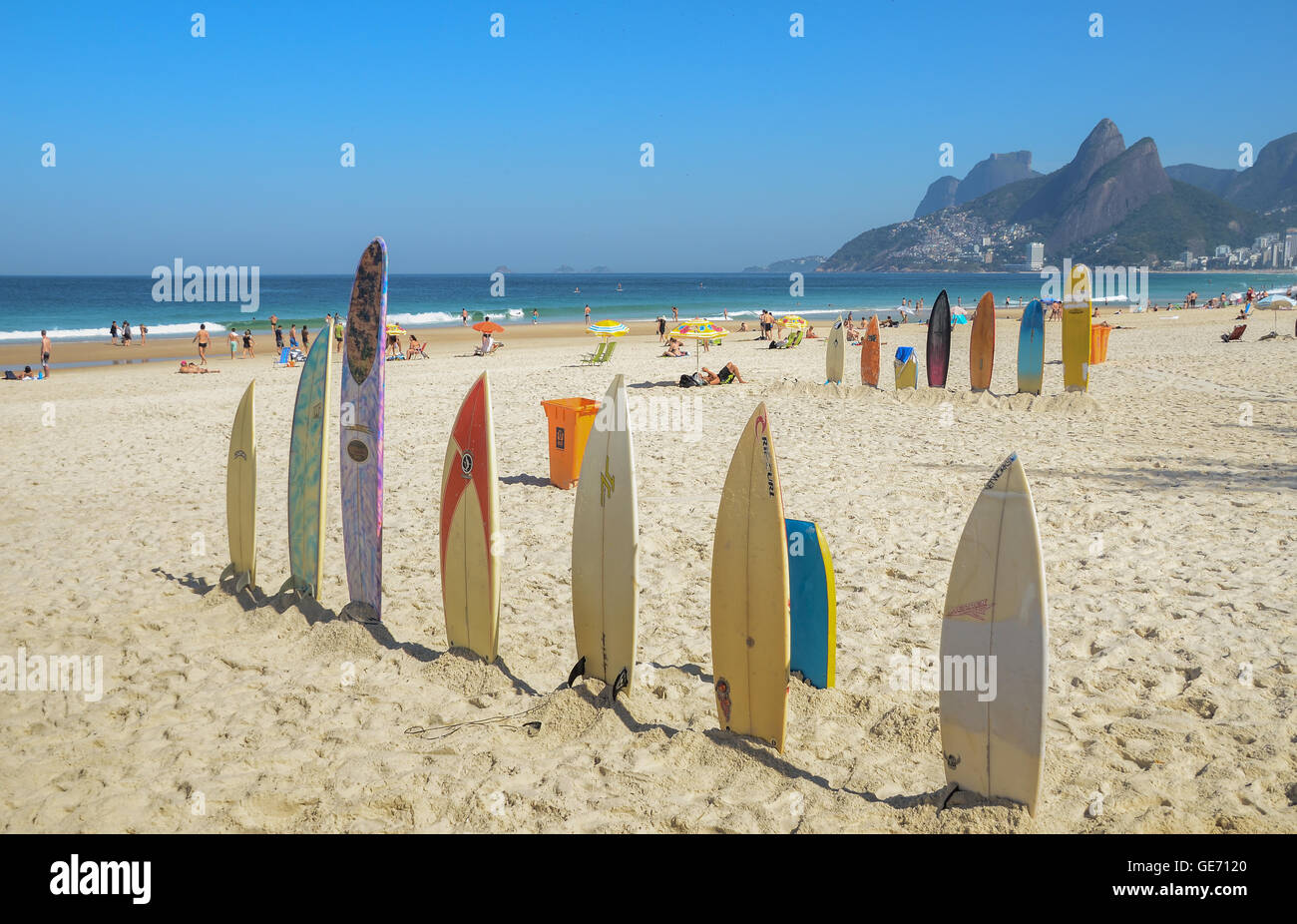 Surfboards and stand up paddle boards line up on the beach in Ipanema ...