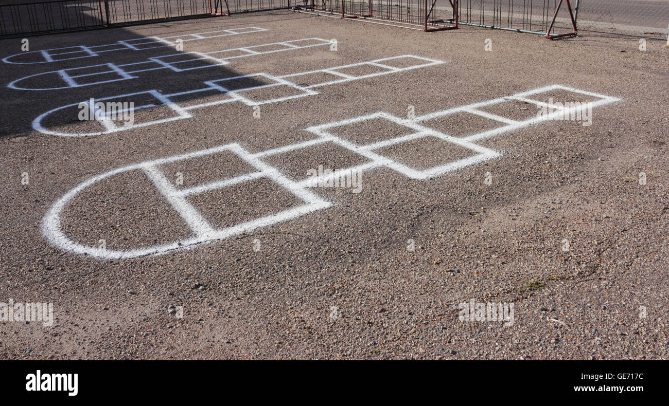 Hopscotch courts in a playground Stock Photo - Alamy
