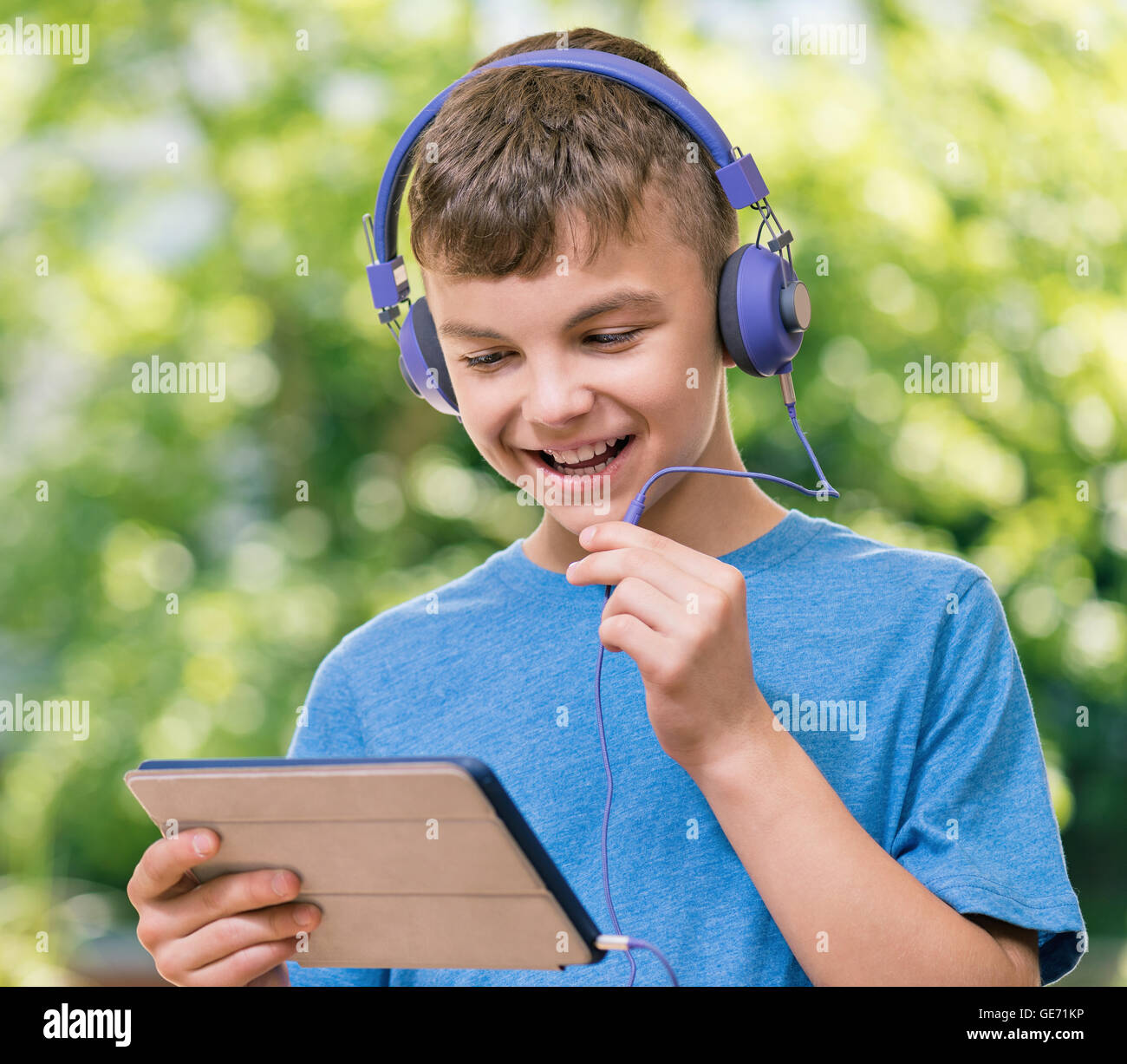 Boy with tablet Stock Photo - Alamy